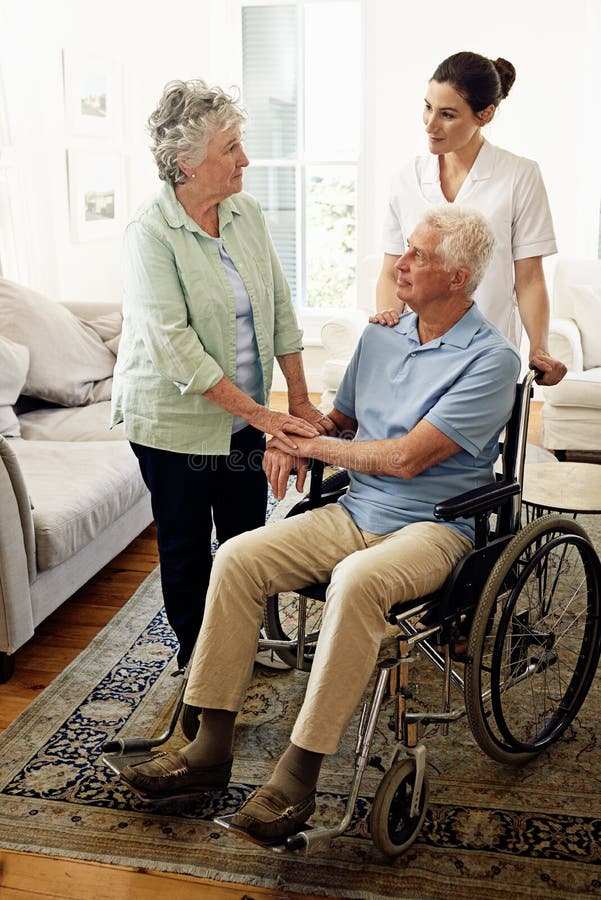 Helping Seniors Live a Full Life. a Smiling Caregiver with a Senior Man ... Helping Seniors Live a Full Life. a Smiling Caregiver with a Senior Man ...
