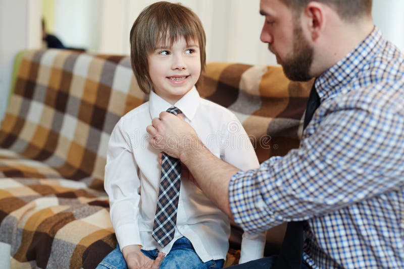 Getting Dressed with Father Stock Photo - Image of people, together ...