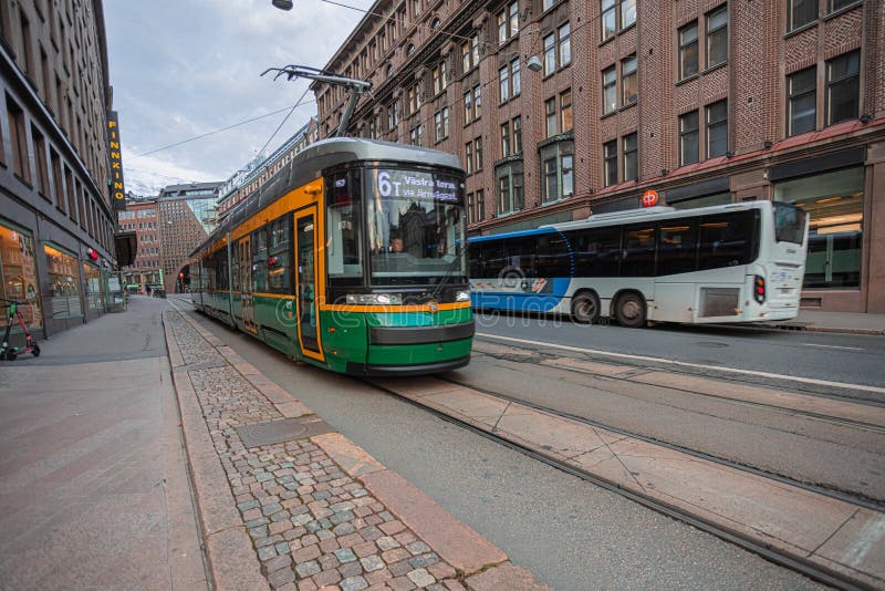 Helsinki, Uusimaa, Finland October 7, 2020 Green Tram in the City ... Helsinki, Uusimaa, Finland October 7, 2020 Green Tram in the City ...