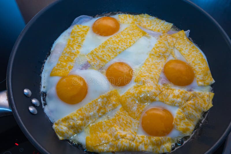 Hemenex of Five Eggs in a Pan. Eggs with Salami and Cheese Stock Image ...