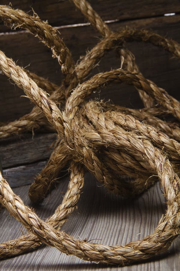 Hemp Rope Wyth Red Hearts and White Rose Petals on the White Wood Table ...