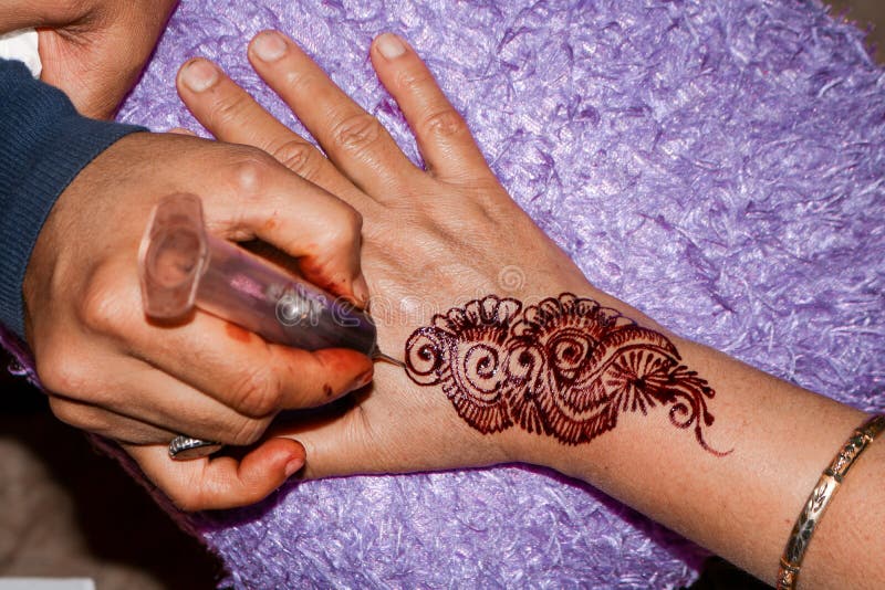 Henna Applying on Hand with Syringe. Stock Image - Image of applying ...