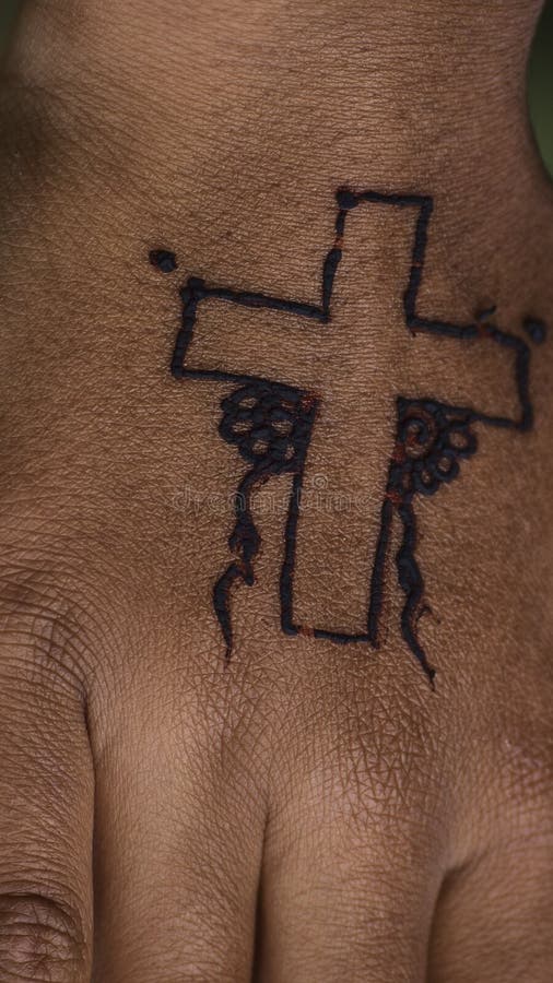 Henna Ink Cross Painted on Hand Stock Photo - Image of painted, henna ...
