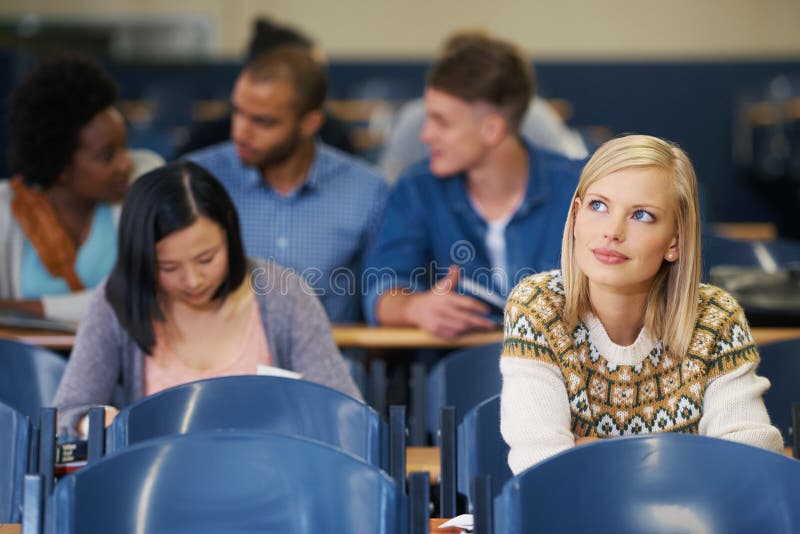Her Education is Important To Her. a Group of Students Sitting in an ...
