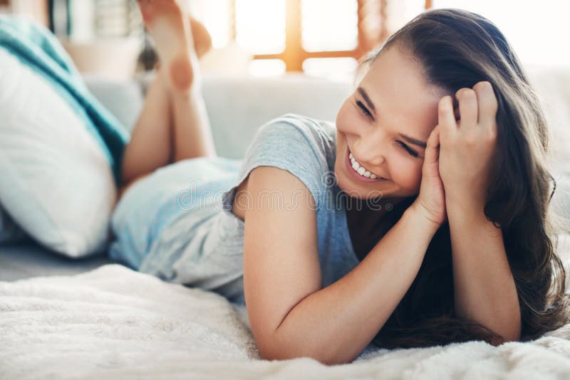 Her Idea of the Perfect Day. an Attractive Young Woman Spending a ... Her Idea of the Perfect Day. an Attractive Young Woman Spending a ...