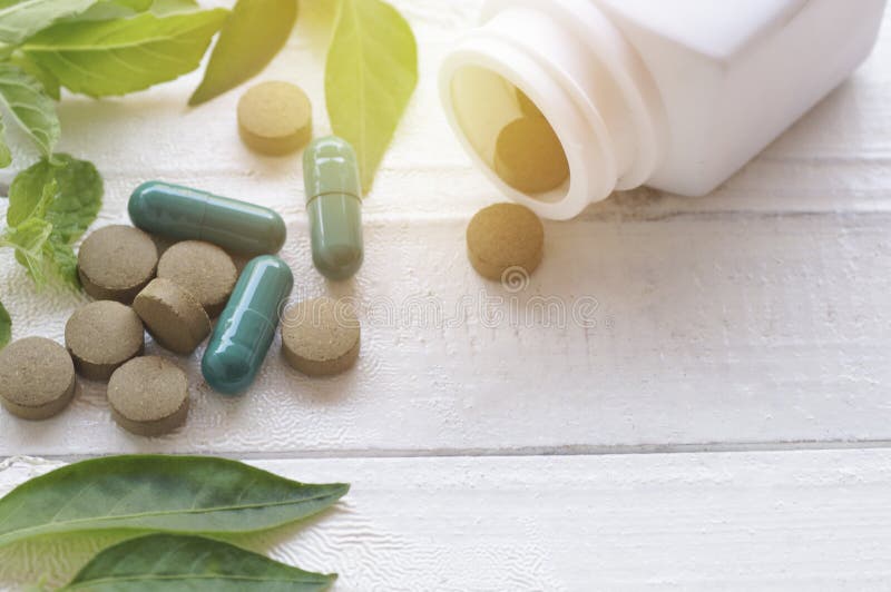 Herb Pill on Top View of Wood Table Stock Image - Image of rustic ...