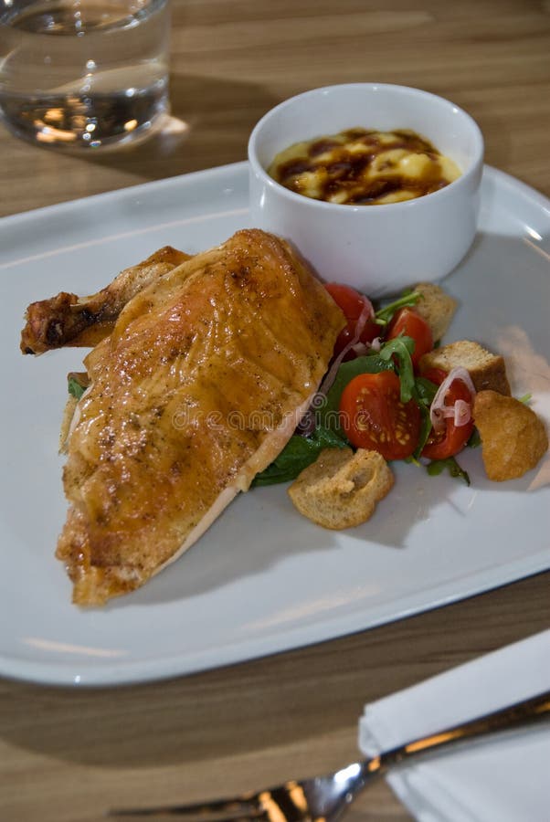 Herb Roasted Organic Chicken Stock Photo - Image of lettuce, chicken ...