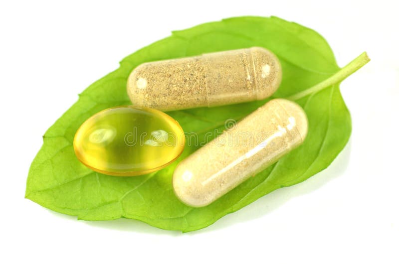 Herbal Capsules and Fish Oil Capsule on Mint Leaf Stock Photo - Image ...