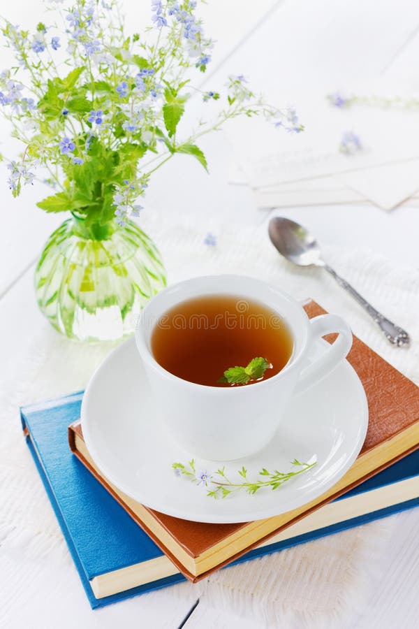 Herbal Tea with Books and Flowers Stock Image - Image of liquid ...