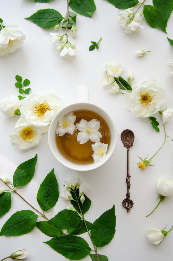 Herbal Tea Composition with Roses, Jasmine, Green Leaves and Tea Spoon ...