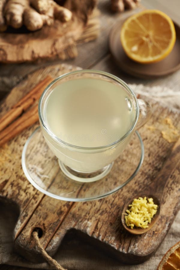 Herbal Tea Made of Fresh Ginger Root with Cinnamon Sticks and Lemon ...