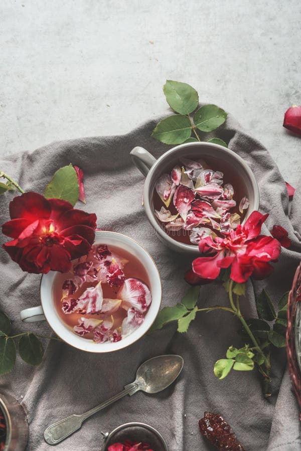 Herbal Tea with Red Roses Petals Stock Photo - Image of herbal, natural ...