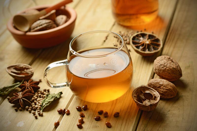 Herbal Tea with Walnuts and Ingredients Around Stock Image - Image of ...