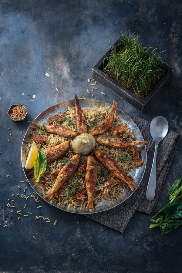 Herbed Rice with Fried Fish, Persian New Year Dish Stock Photo - Image ...