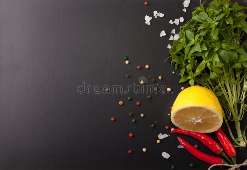 Herbs and Spices. Red Pepper, Salt and Rosmary on a Black Background ...