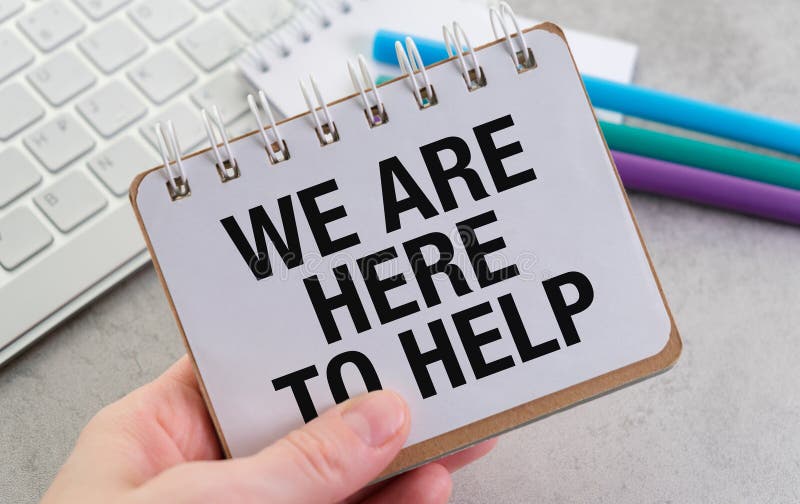 We are Here To Help Text Quote on Open Notepad in Hand, Business ...