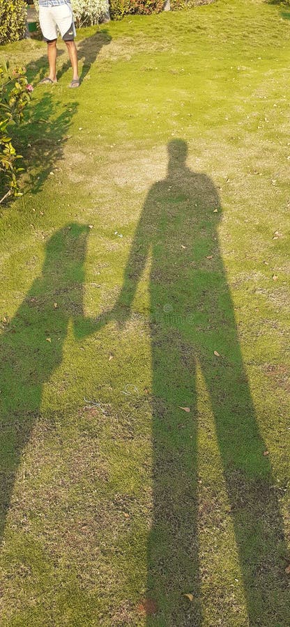 Here Two Shadows are Presented Here that is Father and Daughter Playing ...