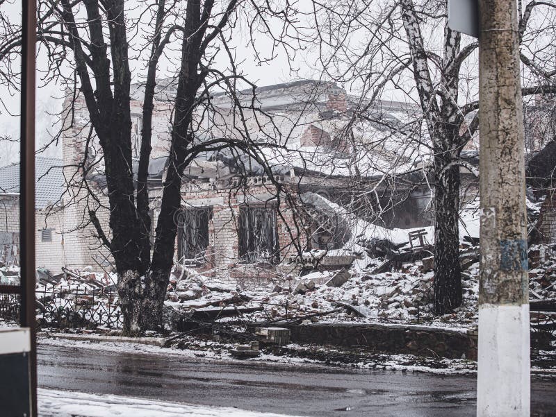The Collapsed Second Floor of the Building and the Destroyed First ...