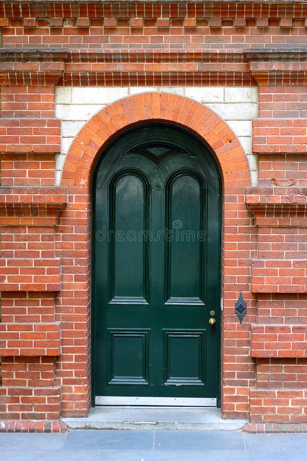 Heritage Arched Door in Red Brick Wall Stock Image - Image of exterior ...