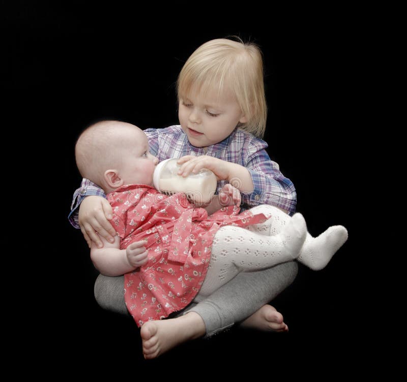 Hermana Del Bebé De La Chica Joven Que Introduce Imagen de archivo ...