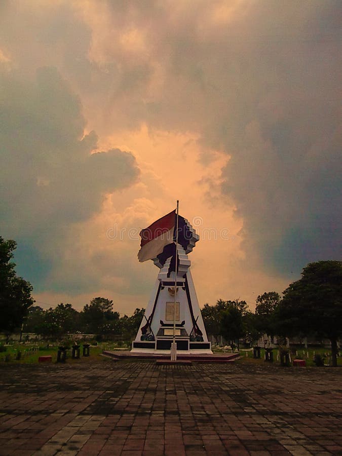 Hero Monument Indonesia with Red Clouds Stock Photo - Image of horizon ...