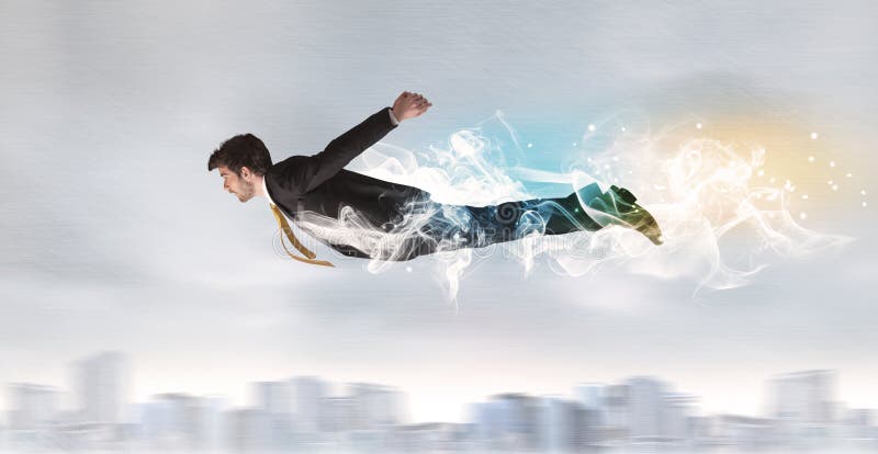Hero Superman Flying Above City with Smoke Left Behind Stock Photo ...