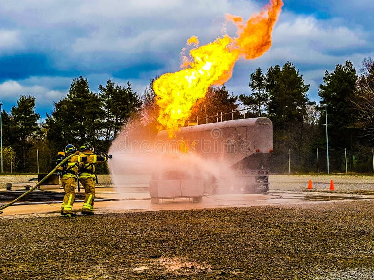 Heroic Firefighting Teamwork Editorial Image - Image of evening, person ...