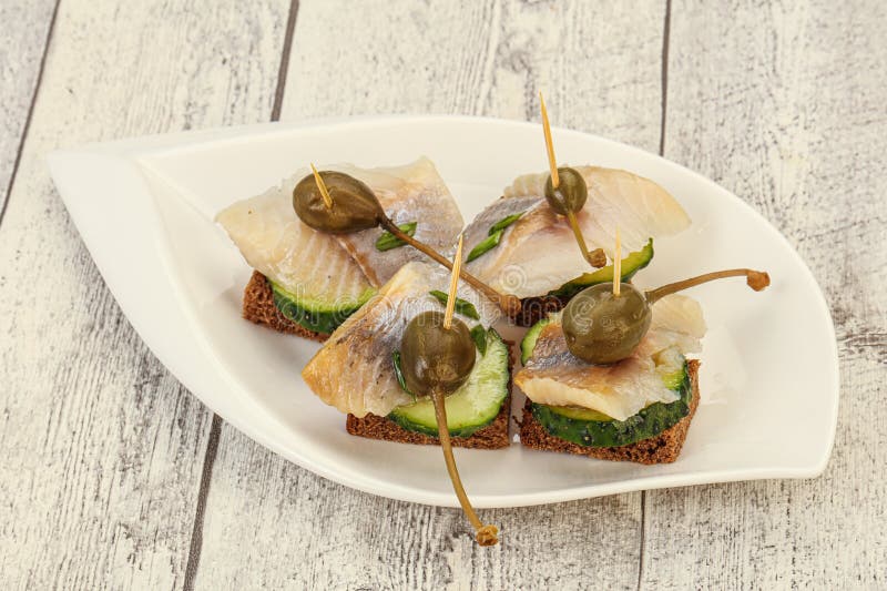 Herring Fillet Canape with Caperberry Stock Image - Image of healthy ...