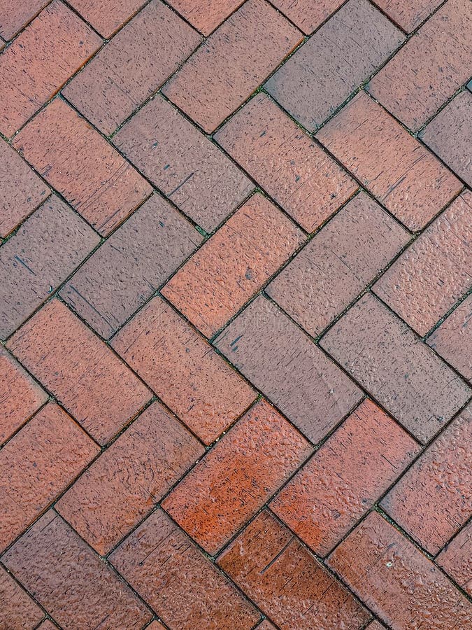 Herringbone Brick Pattern with Red and Brown Bricks, Showcasing a ...