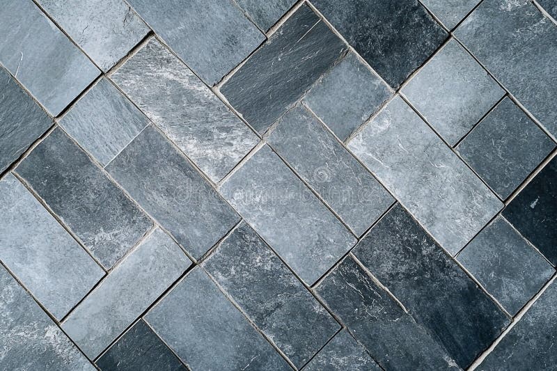Herringbone Pattern with Natural Stone Tiles Creates a Timeless ...
