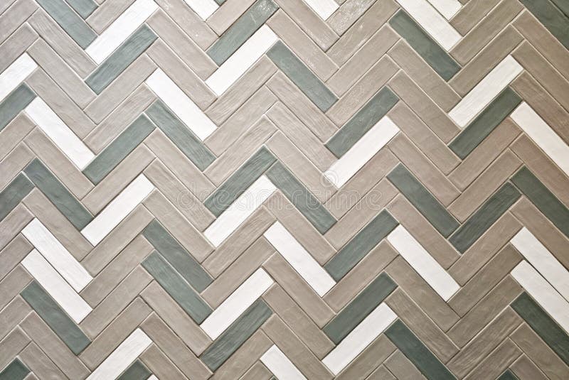 Herringbone Pattern Wall Tiles Featuring a Blend of Warm Beige, Cool ...