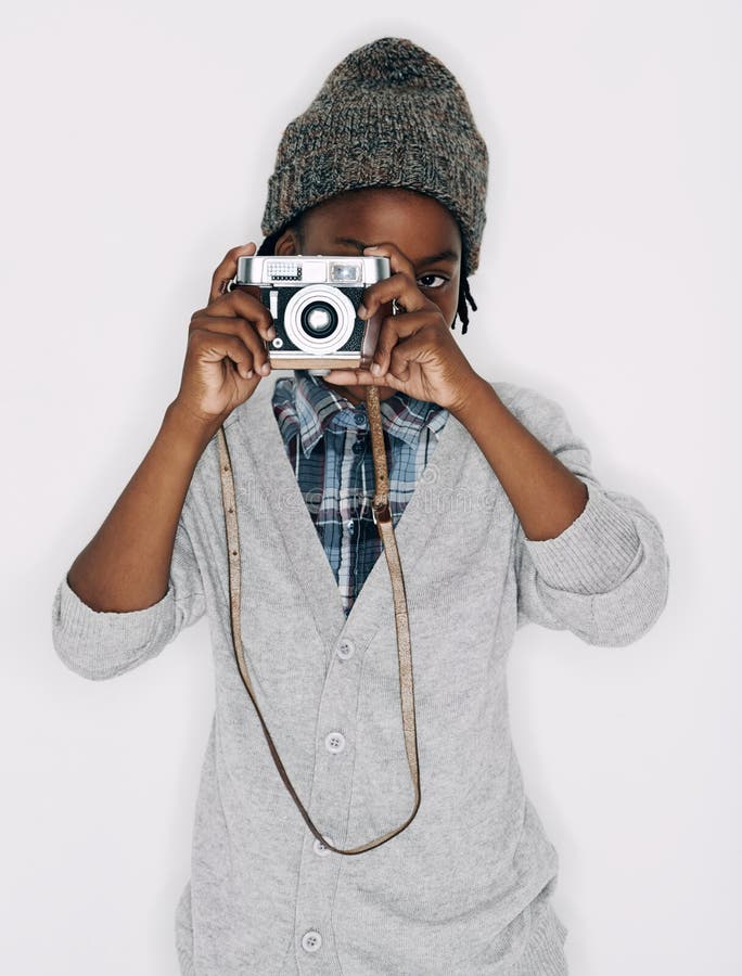 Hes an Aspiring Photographer. a Young Boy Taking Snapshots with His ...