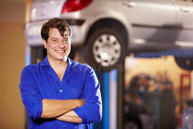 Hes Confident in His Work. Portrait of a Confident Male Mechanic in the ...