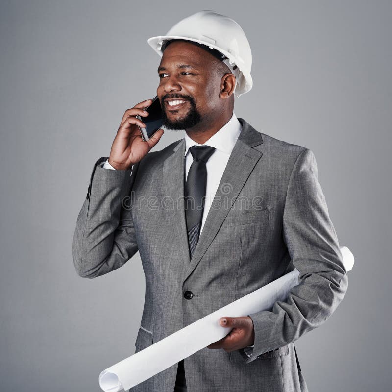 Hes always Connected To His Team. a Well-dressed Civil Engineer Using ...