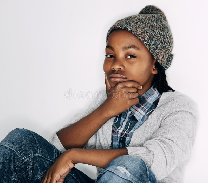 Hes a Cool Kid. Portrait of a Young Boy Sitting in the Studio. Stock ...