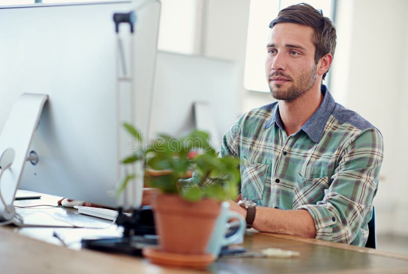 Hes Creating Digital Solutions. a Casually-dressed Young Man at Work on ...