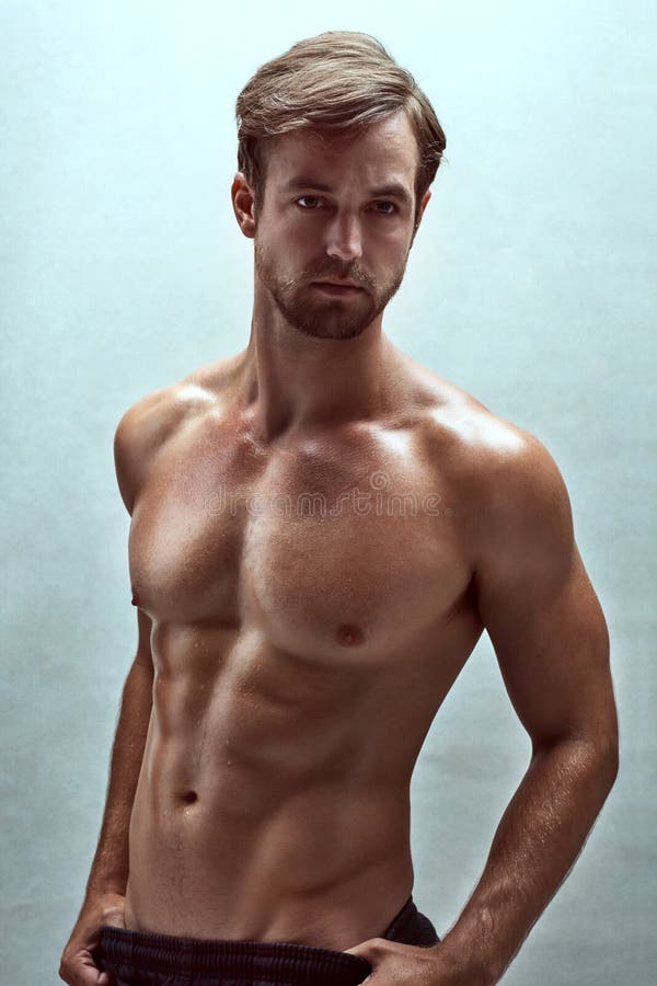 Hes a Dream Come True. a Handsome Bare-chested Young Man Posing in the ...