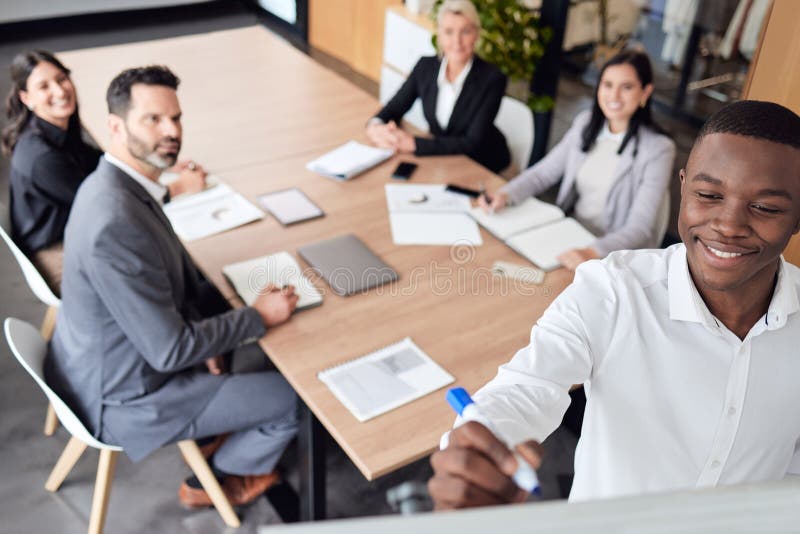 Hes an Expert at this Topic. a Group of Businesspeople Having a Meeting ...