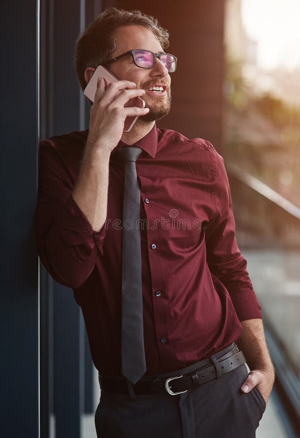 Hes always the First To Hear about it. a Young Businessman Using a ...