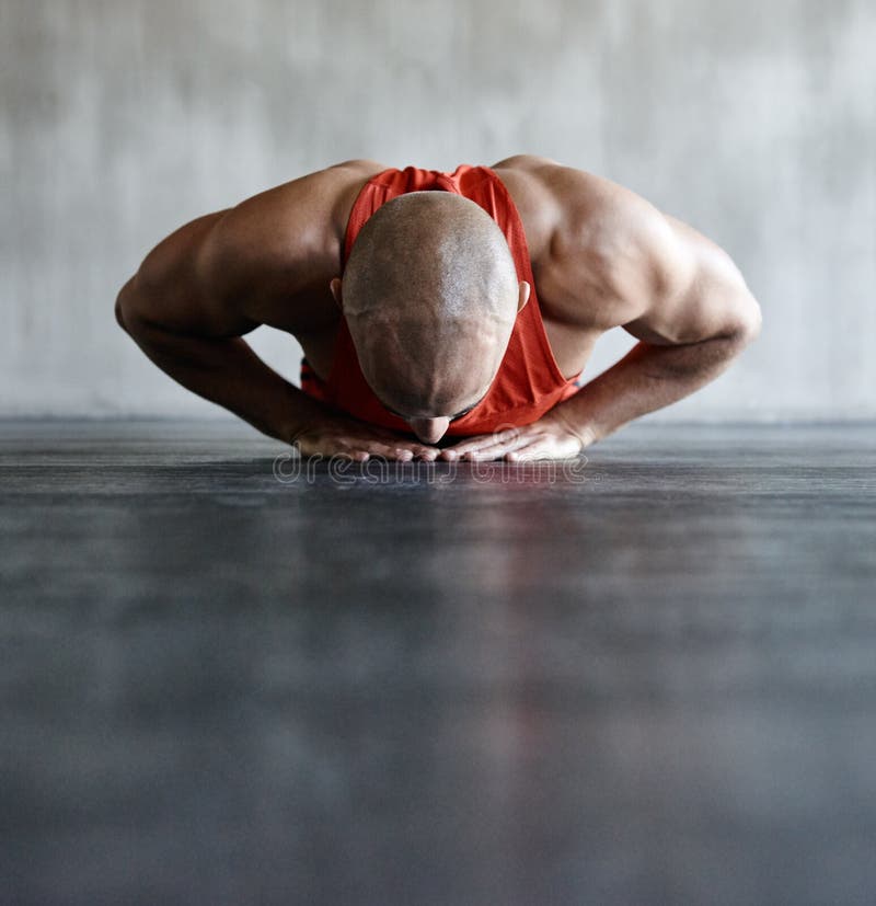 Hes 100 Focused. a Man Doing a Challenging Workout at the Gym. Stock ...