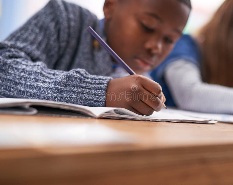 Hes Focused on the Work. Elementary School Children in Class. Stock ...