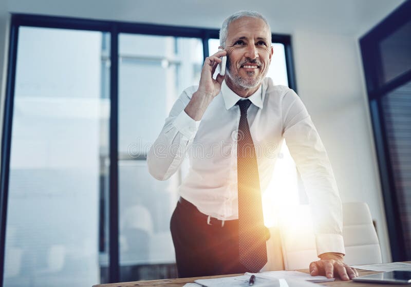 Hes a Hard Working Professional. a Businessman Standing in an Office ...