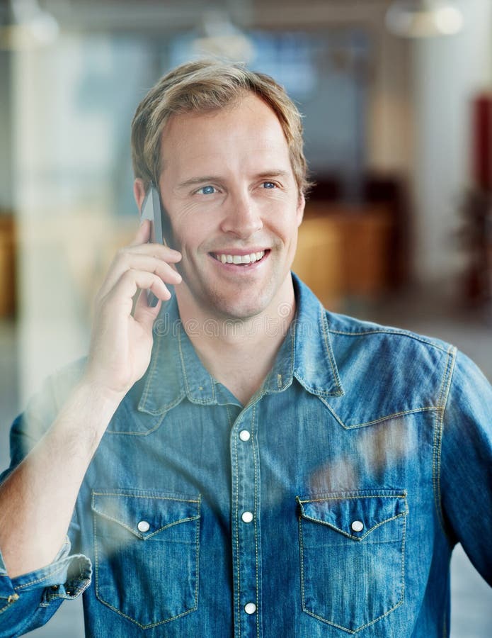 Hes a Model Employee. a Casually-dressed Businessman Standing in His ...