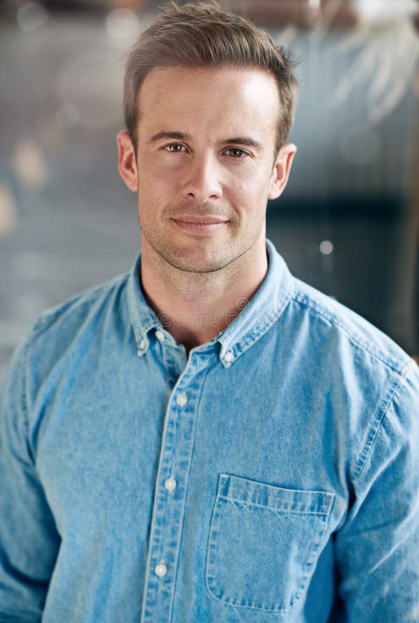 Hes a Model Employee. a Casually-dressed Businessman Standing in His ...