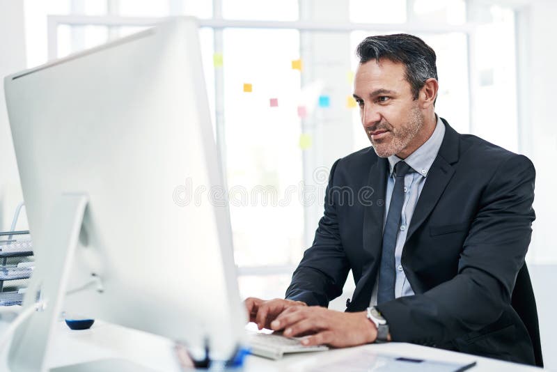 Hes No Stranger To Hard Work. a Mature Businessman Working on a ...