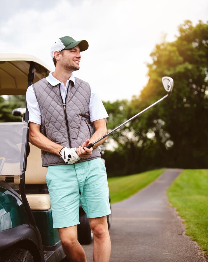 Hes Ready for Some Golf. a Handsome Young Man Leaning Against a Golf ...