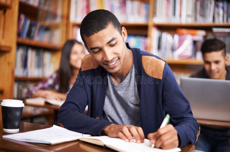 Hes Such a Diligent Student. a Handsome Young Student Working ...
