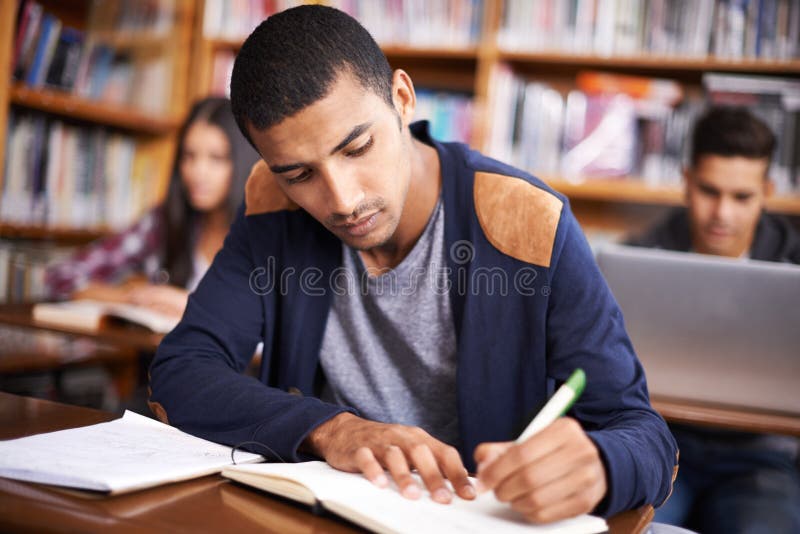Hes Such a Diligent Student. a Handsome Young Student Working ...