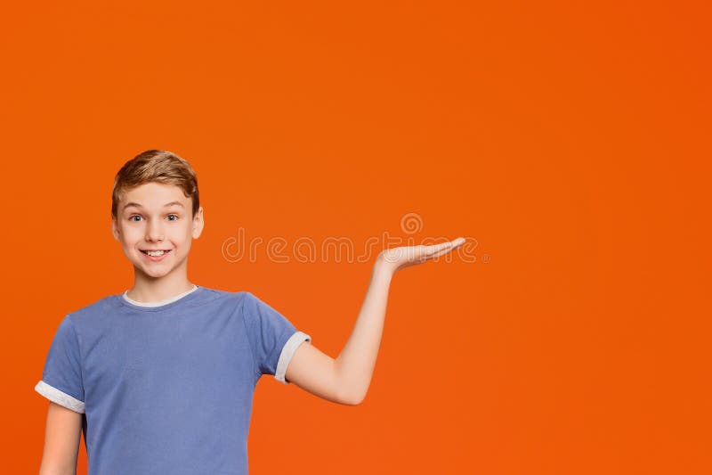 Hesitant Boy Spreading Hands Sideway with Empty Space Stock Image ...