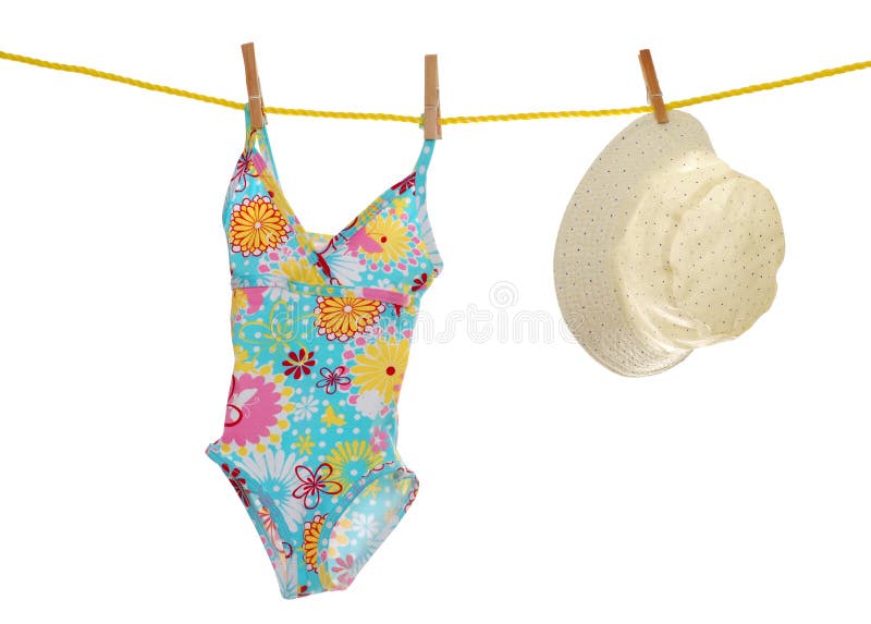 Het Badpak Van Het Kind En Strandhoed Op Drooglijn Stock Foto - Image ...
